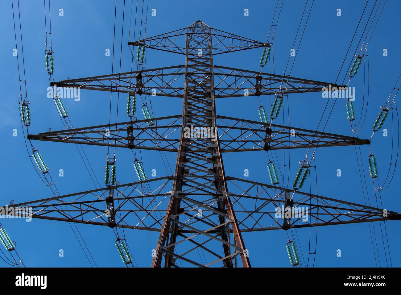 Metal pylon carrying overhead electric cables of high voltage lines ...