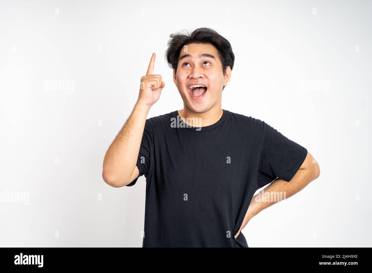 man with fingers pointing up get an idea Stock Photo - Alamy