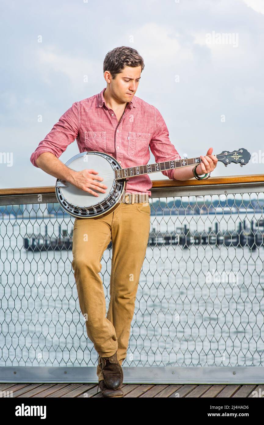 Dressing in light red shirt, dark yellow trousers and brown shoes ...