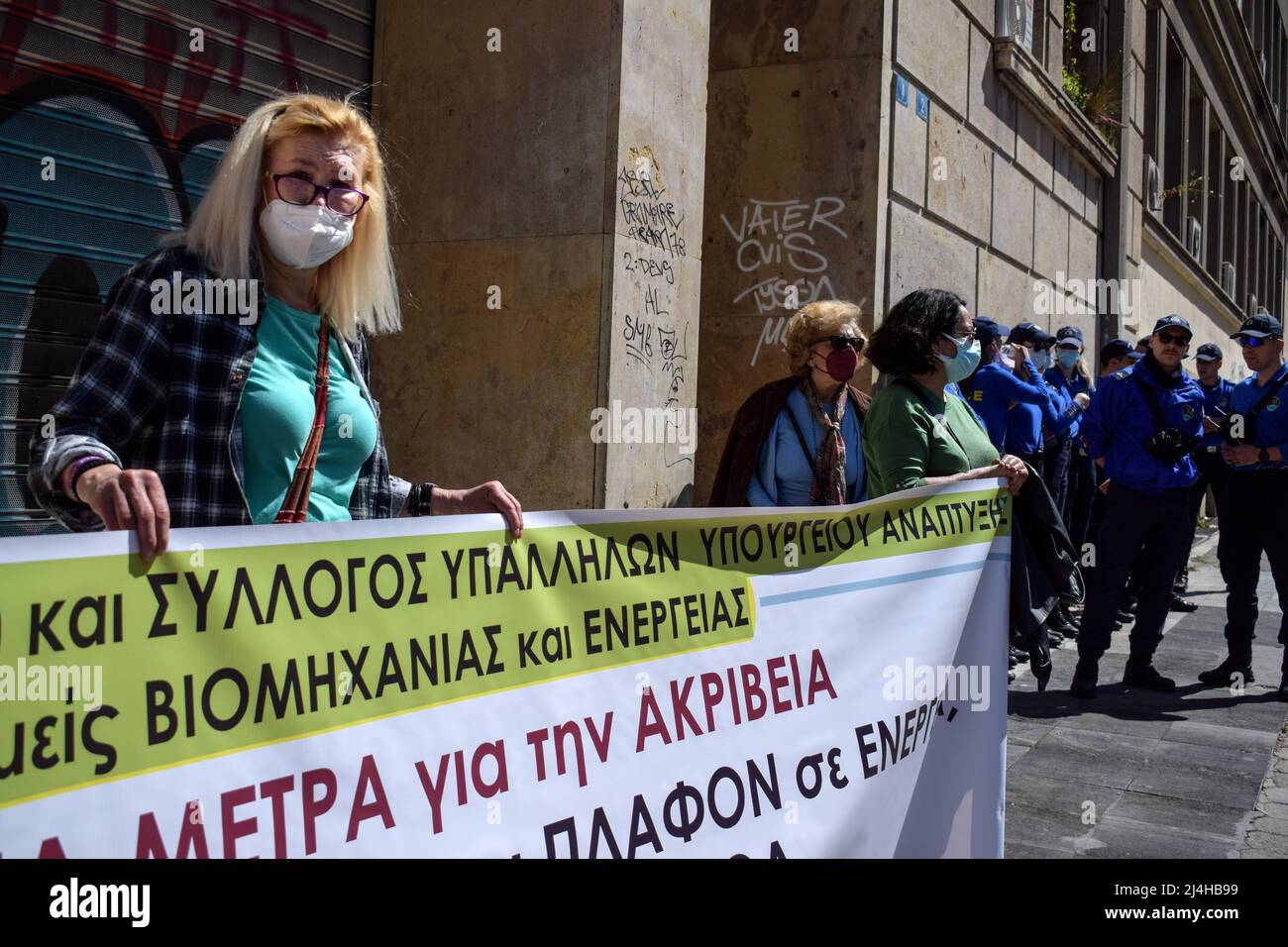 Athens, Greece. 14th Apr, 2022. A woman protests in front of the ...