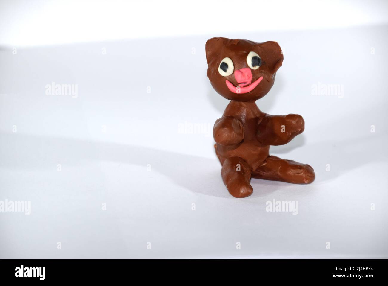 Plasticine bear. Toys made of plasticine on a white background Stock ...