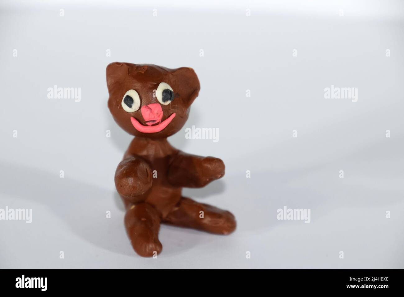 Plasticine bear. Toys made of plasticine on a white background Stock ...