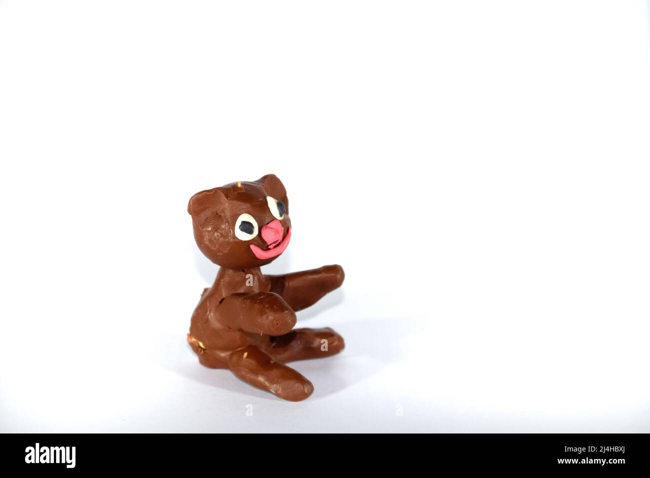Plasticine bear. Toys made of plasticine on a white background Stock ...