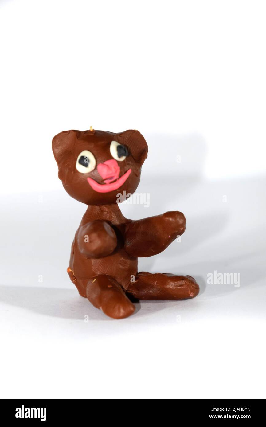Plasticine bear. Toys made of plasticine on a white background Stock ...