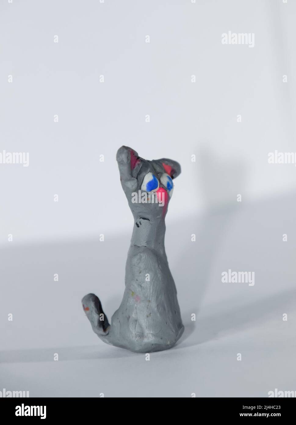 Plasticine cat. Plasticine toy on a white background Stock Photo - Alamy