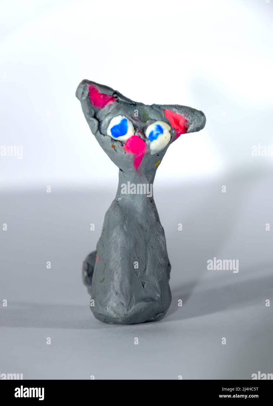 Plasticine cat. Plasticine toy on a white background Stock Photo - Alamy