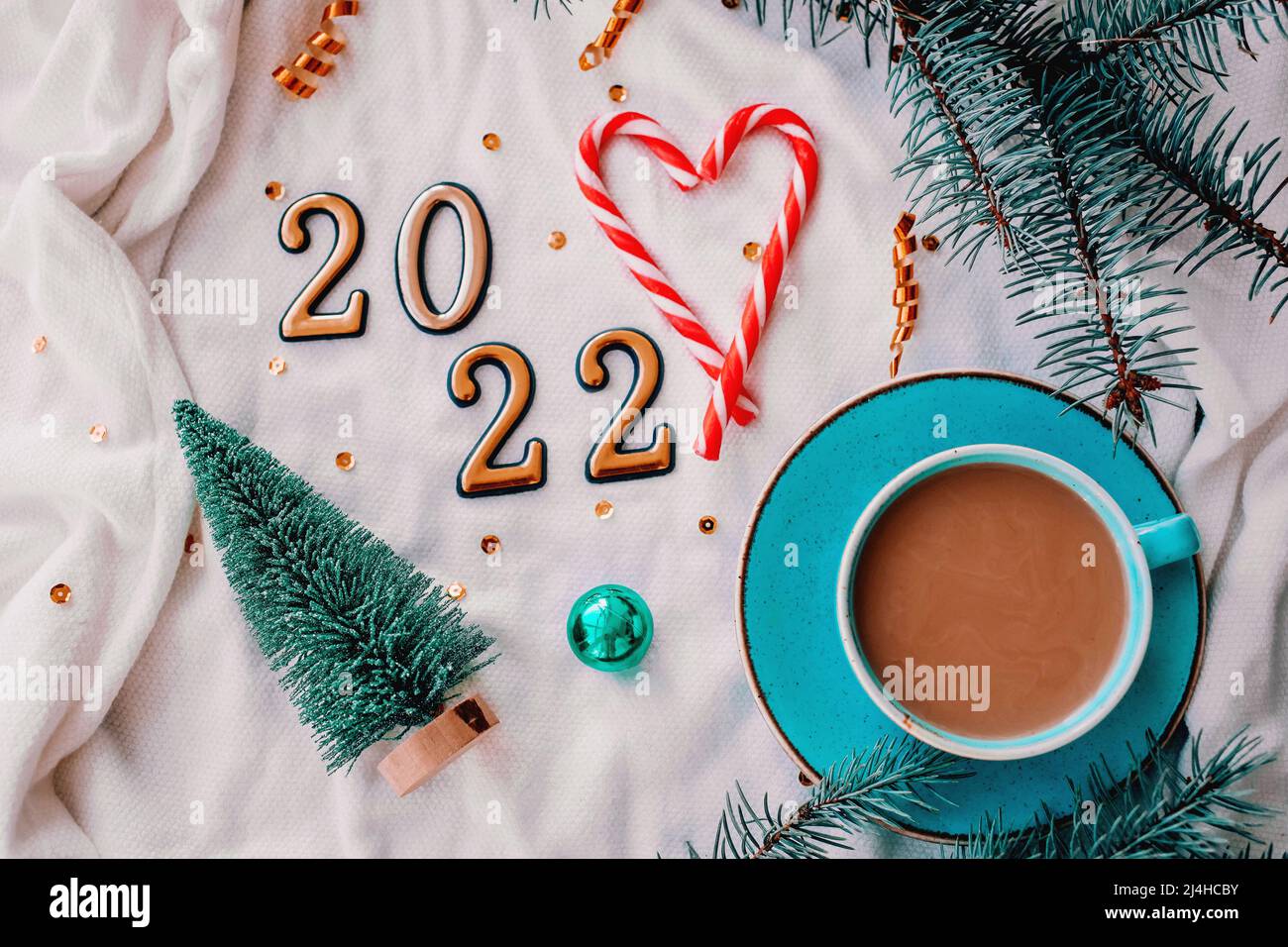 Christmas numbers 2022, a cup with coffee and a Christmas tree. New ...