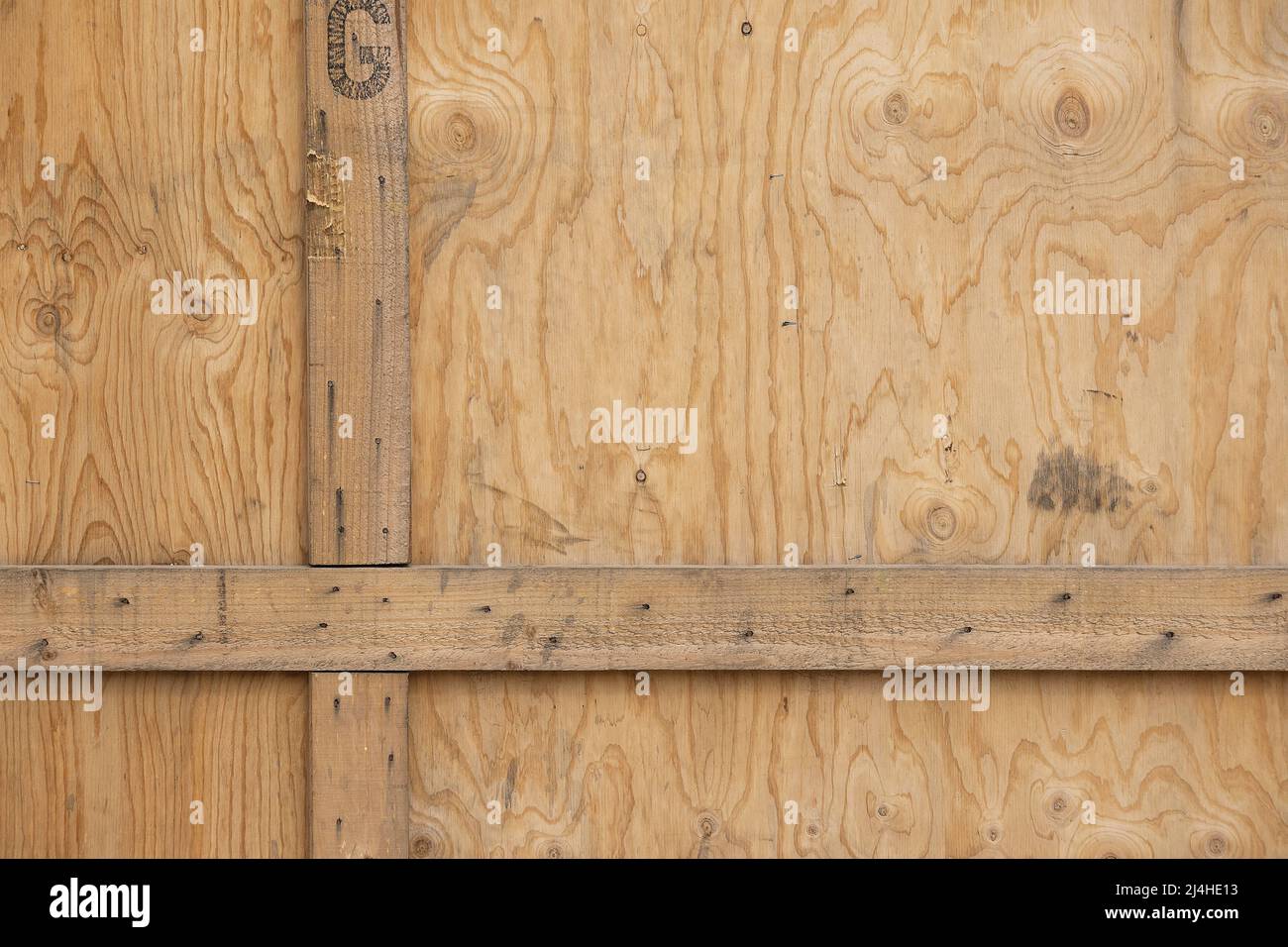 closeup in horizontal view of the side of a large wooden box for ...
