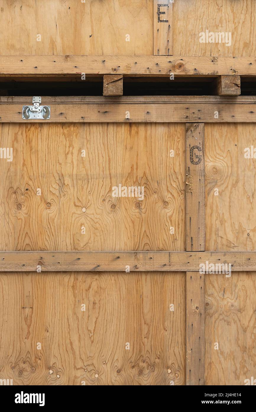 closeup in vertical view of the side of a large wooden box for ...