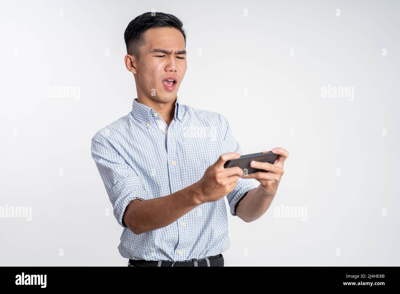 Male businessman gamer playing mobile hi-res stock photography and ...
