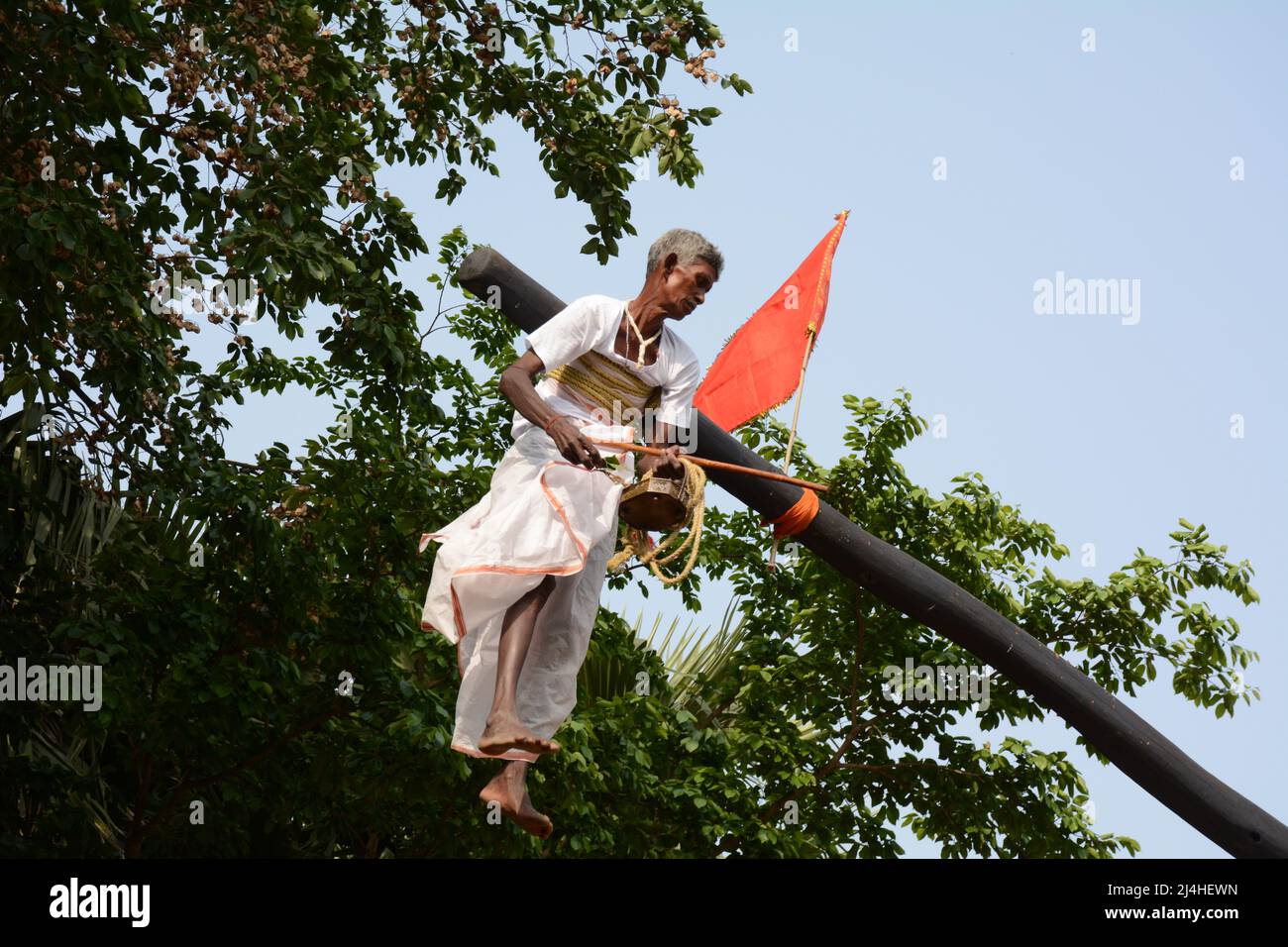 Santiniketan, India. 15th Apr, 2022. Santal Charak Puja is performed ...