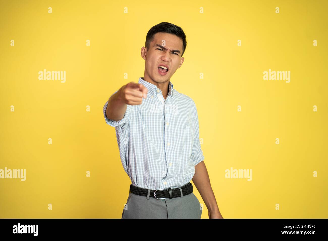 Angry businessman pointing front hi-res stock photography and images ...