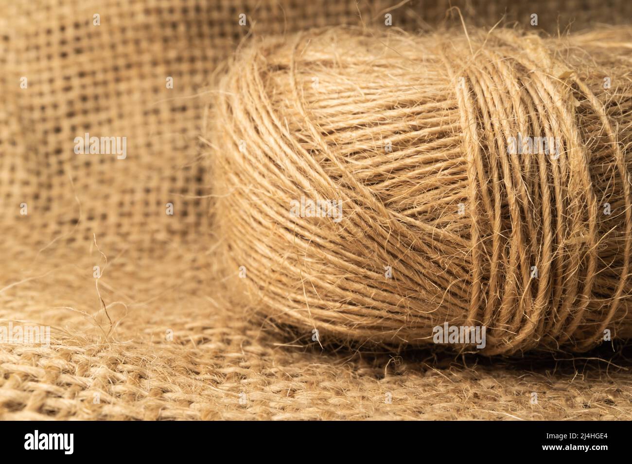 Linen rope roll and natural linen fabric texture. Soflt light and ...