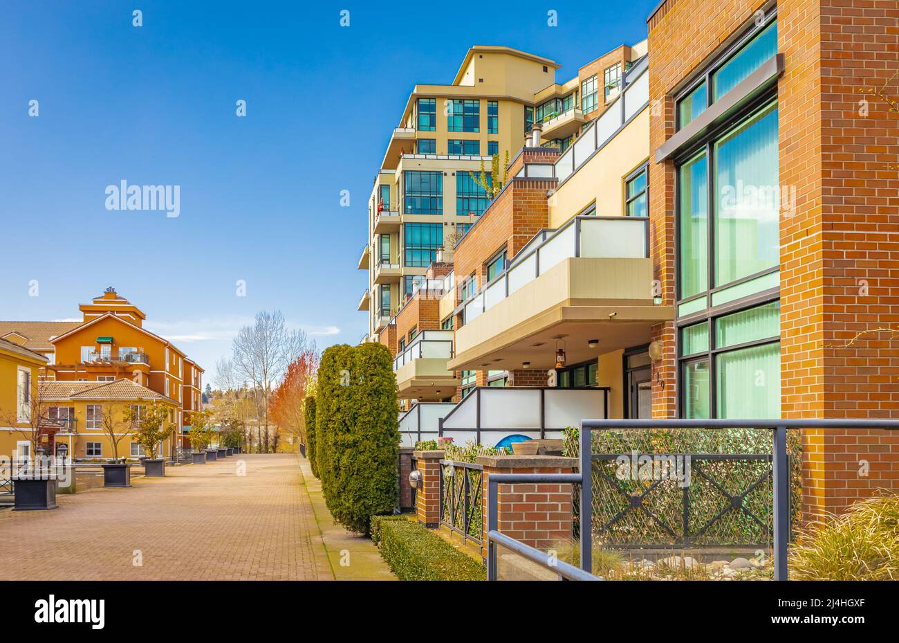 Neighborhood modern houses on sunny day in New Westminster BC, Canada ...