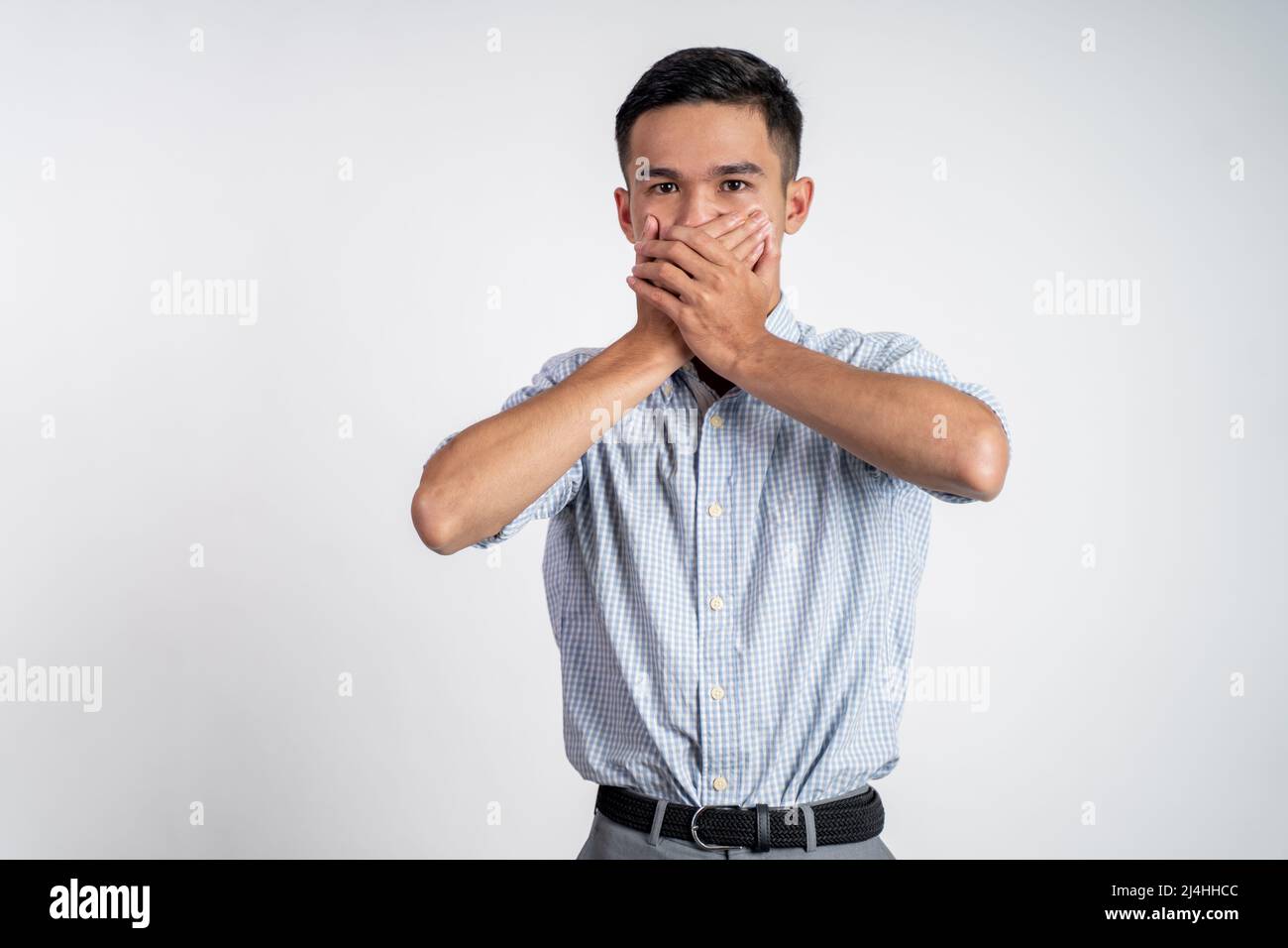 man cover his nose and feeling disgusted by the smell Stock Photo - Alamy