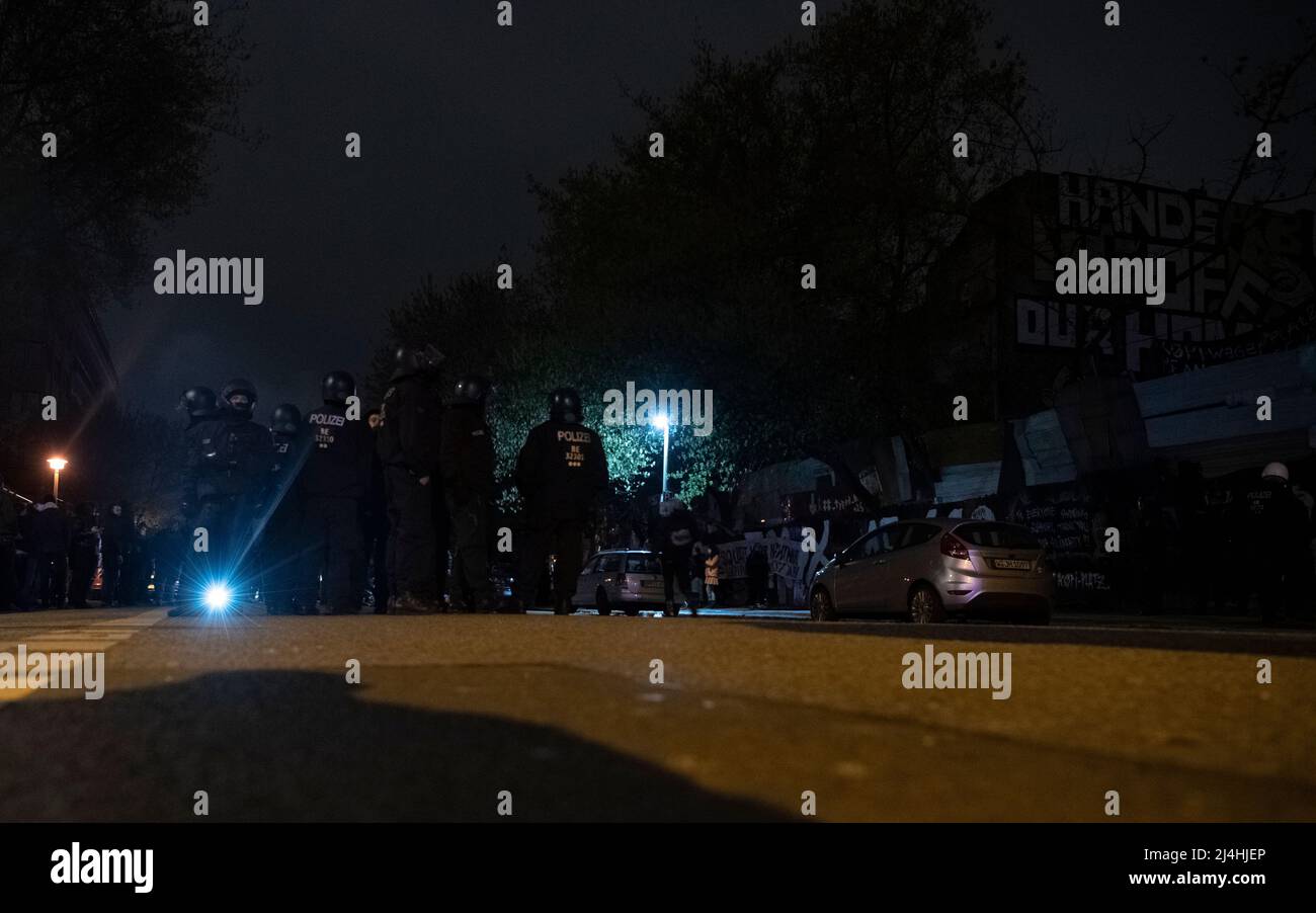 Berlin, Germany. 15th Apr, 2022. Police officers stand on the street in ...