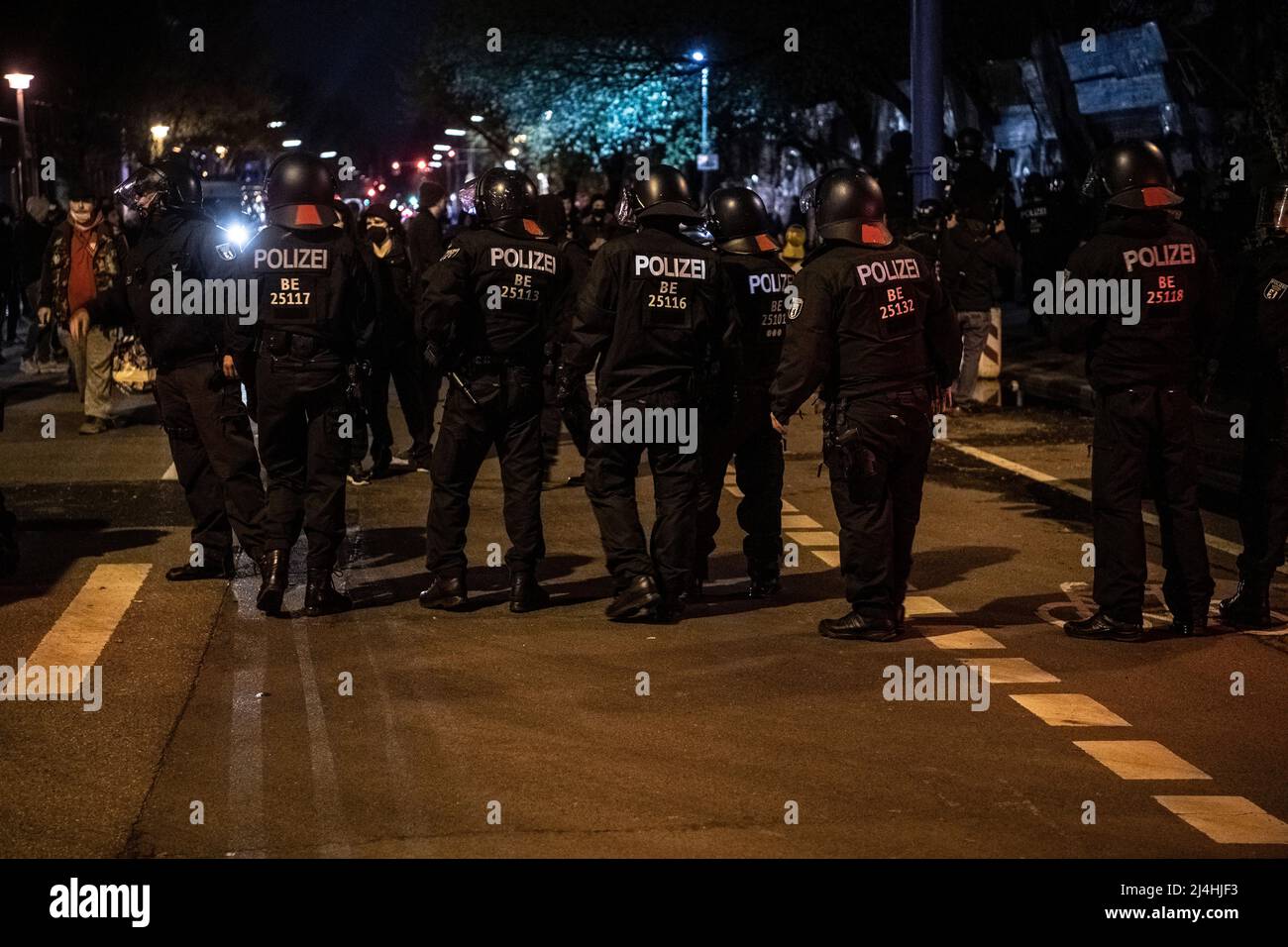 Berlin, Germany. 15th Apr, 2022. Police officers stand on the street in ...