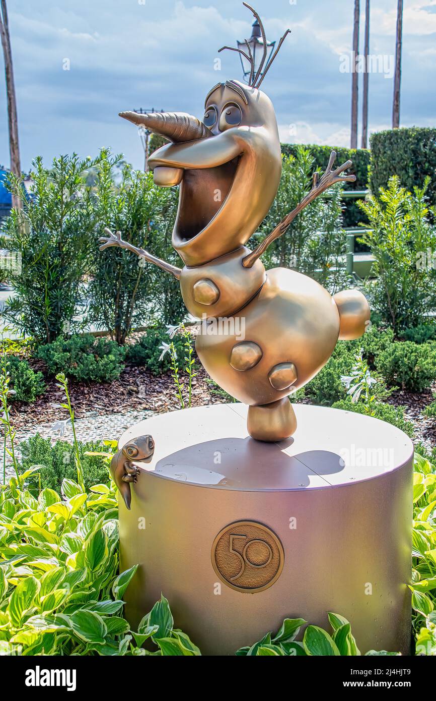 Olaf Gold Statue 50th Anniversary Disney Epcot Stock Photo - Alamy