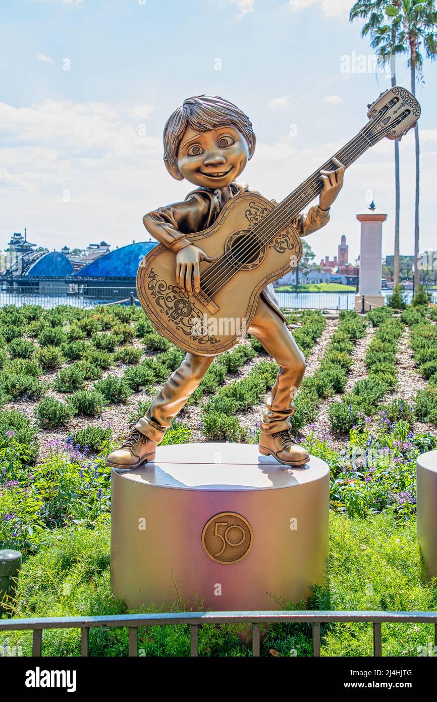 Miguel Gold Statue 50th Anniversary Disney Epcot Stock Photo - Alamy