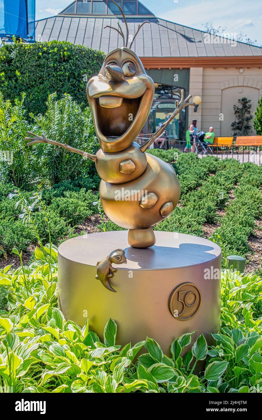 Olaf Gold Statue 50th Anniversary Disney Epcot Stock Photo - Alamy