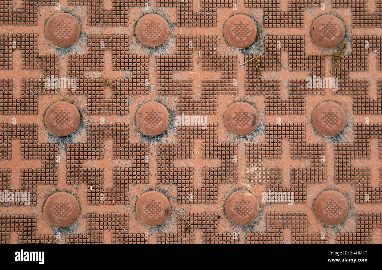 orange pavement studs shot close up in landscape format for use as a ...