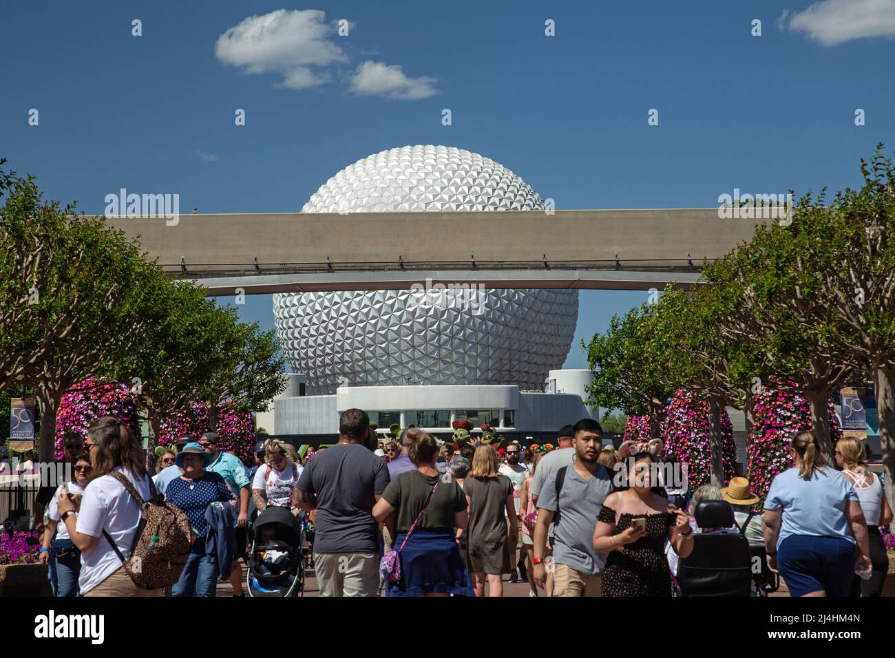 Epcot theme park, Orlando, Florida, USA, March 25th, 2022, people ...