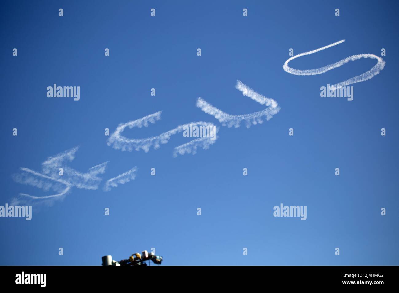 The name Jesus in sky writing from a plane Stock Photo - Alamy