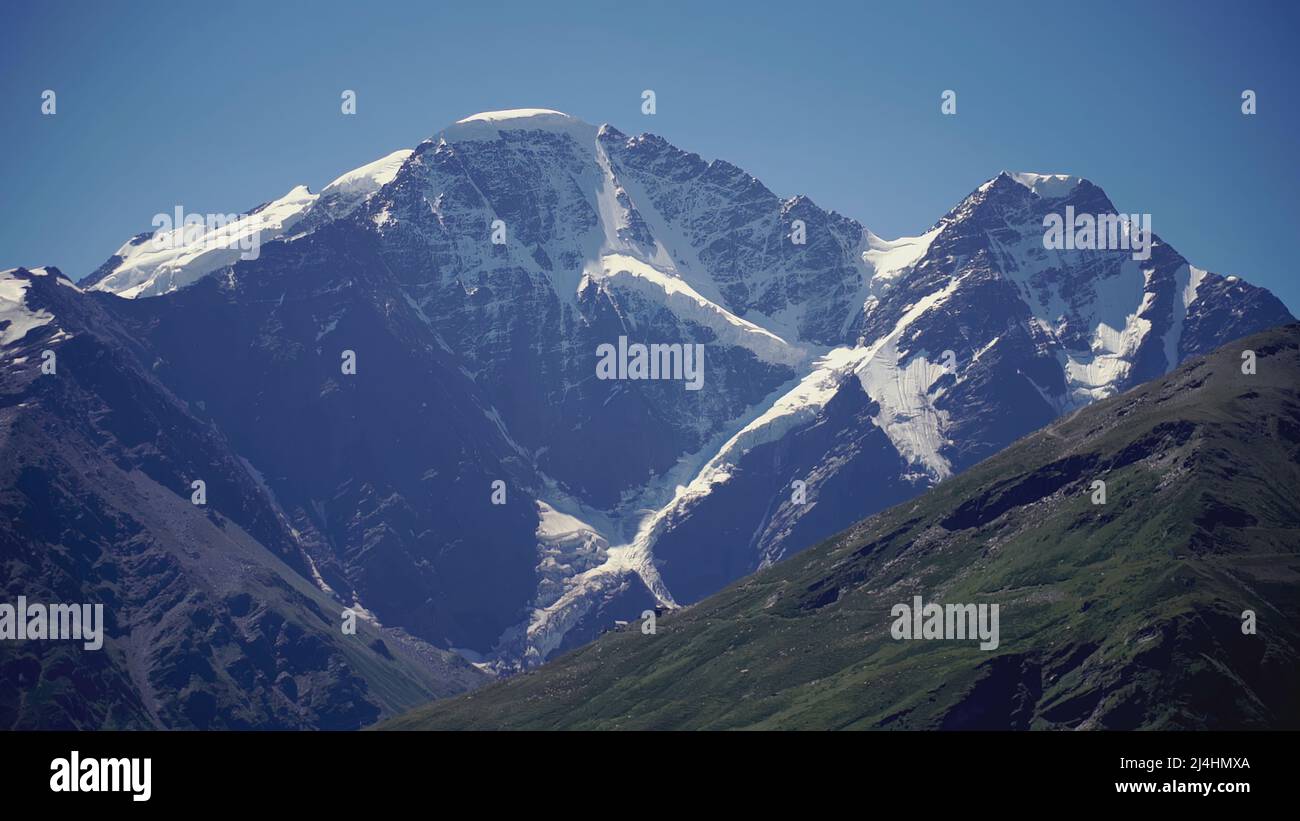 Beautiful high mountains with snow. CLIP. Blue mountains and white ...