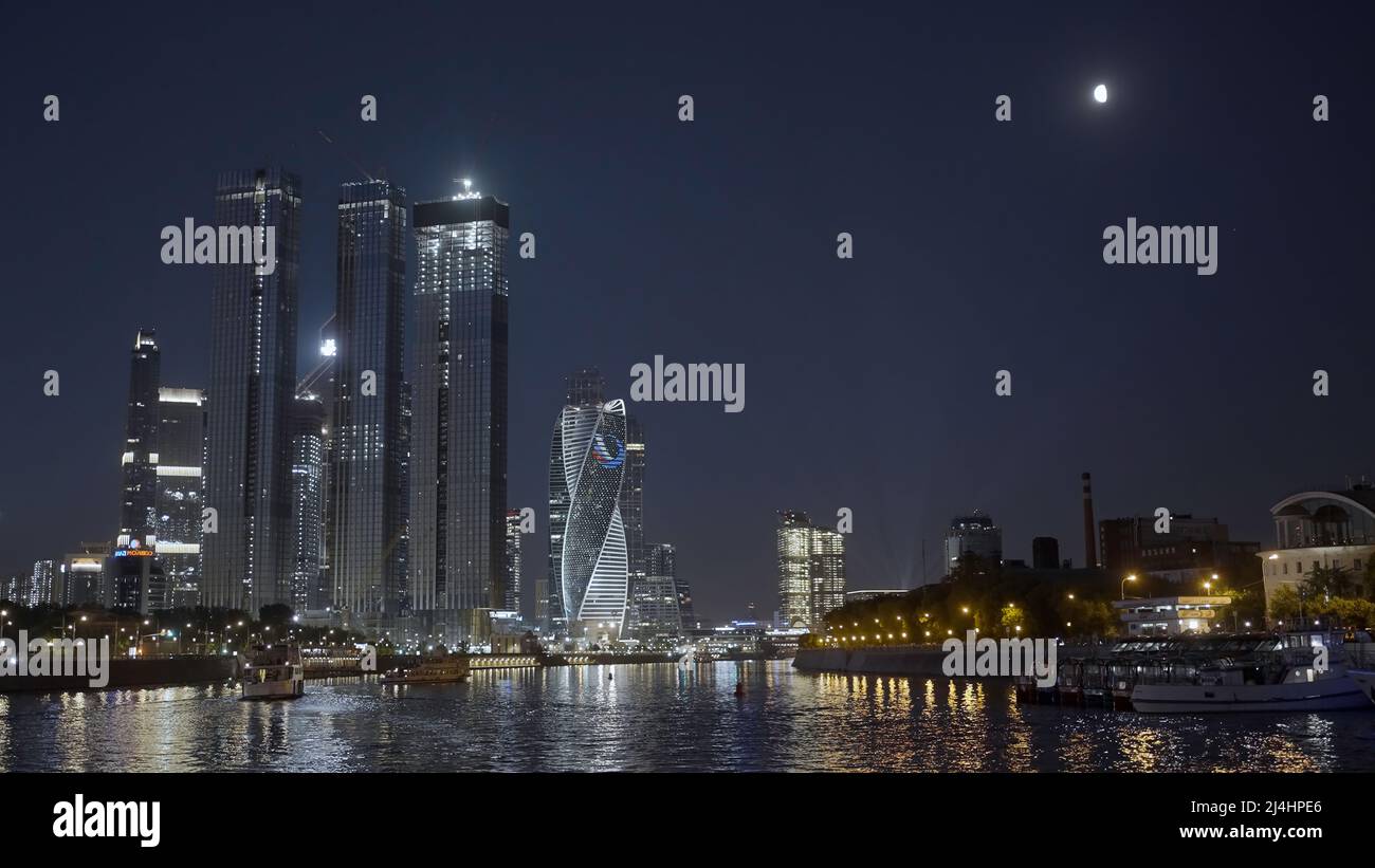 Moscow 2021. Action. Beautiful huge evening buildings near the river in ...