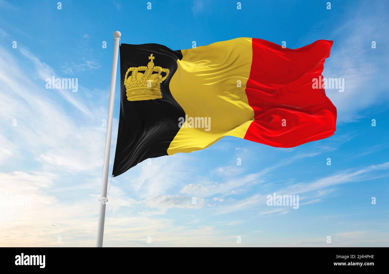 official flag of Belgium yacht ensign, Belgium at cloudy sky background ...