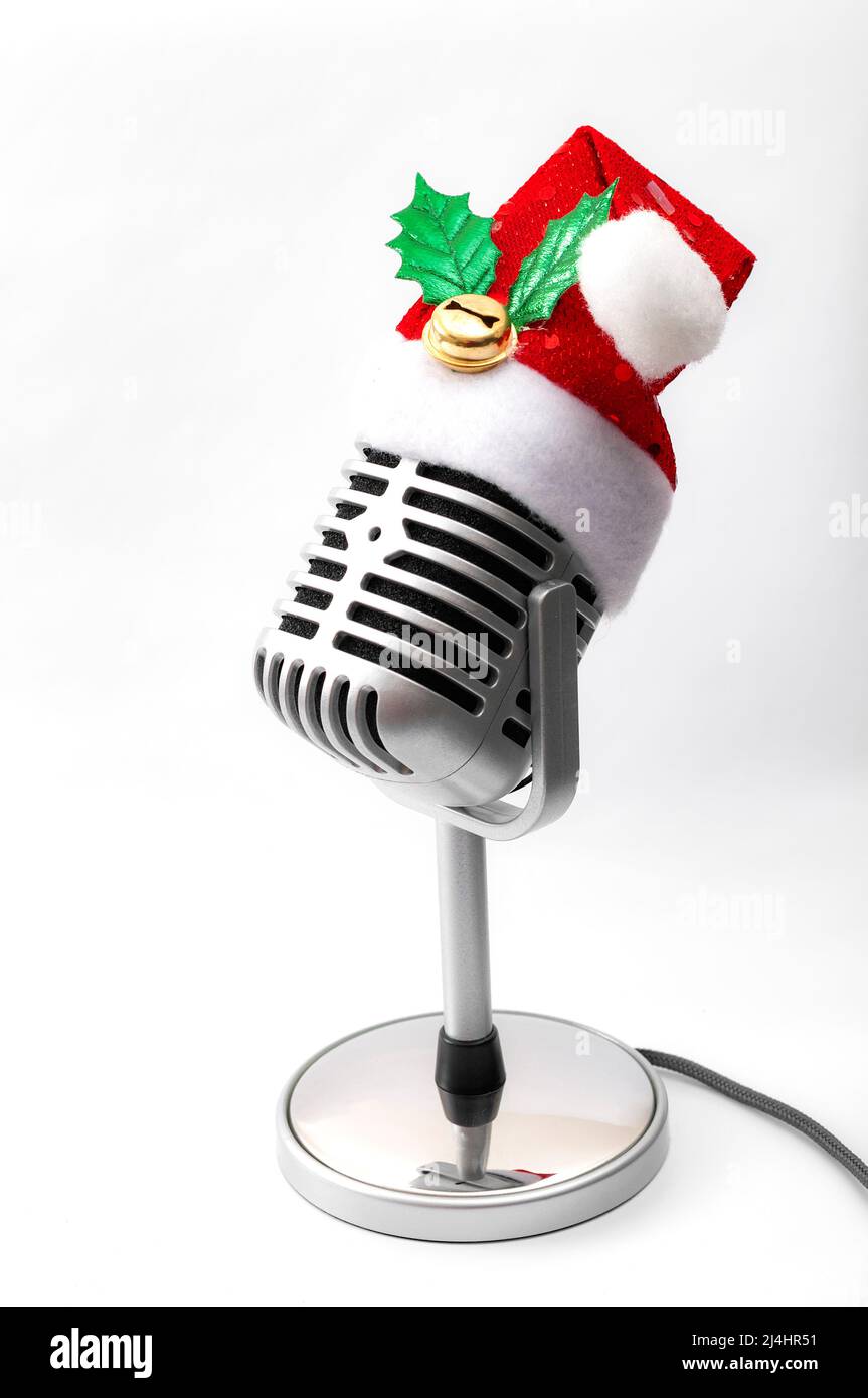 Christmas carols and winter sogs concept with a vintage metallic chrome ...