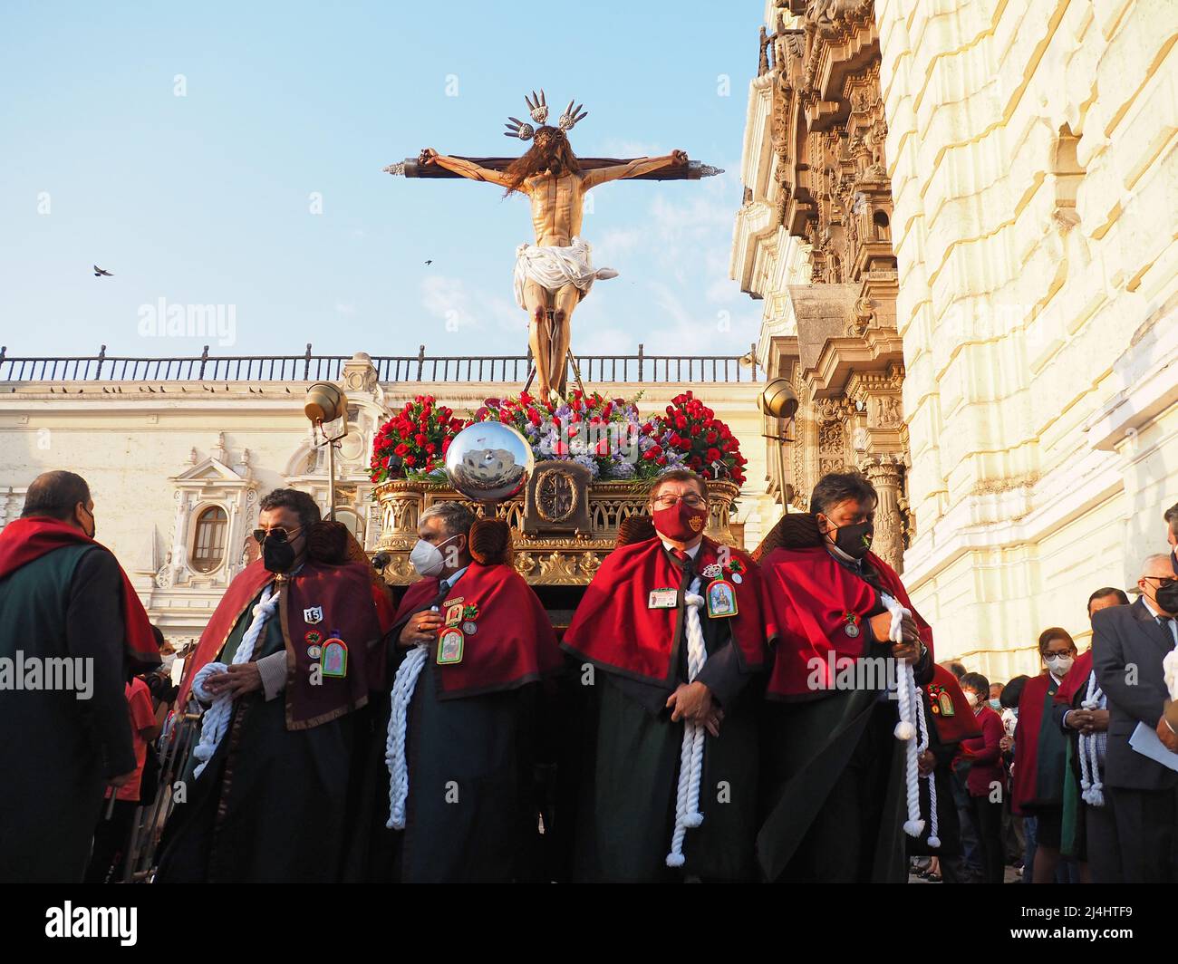 Lima, Peru. 15th Apr, 2022. Catholic devotees carrying on a religious ...