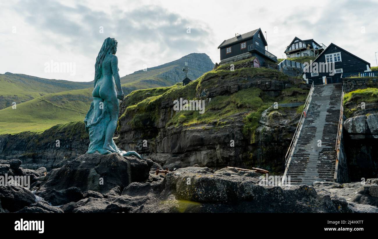 View of the statue of the Seal Woman - Kópakonan, the village ...