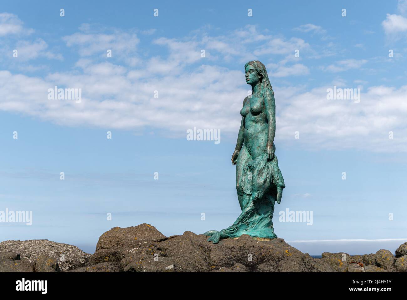 View of the statue of the Seal Woman - Kópakonan, the village ...
