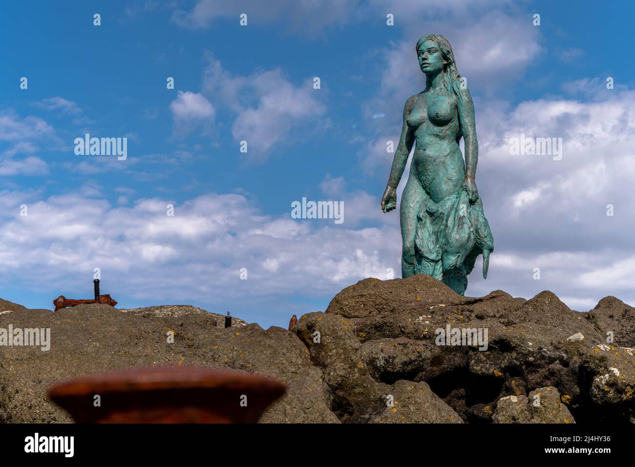 View of the statue of the Seal Woman - Kópakonan, the village ...
