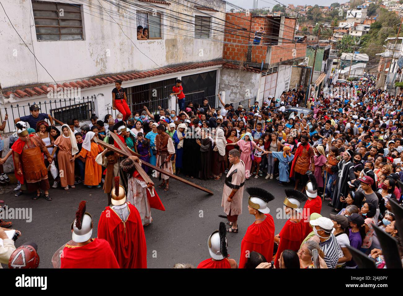 15 April 2022, Venezuela, Caracas: People take part in a representation ...