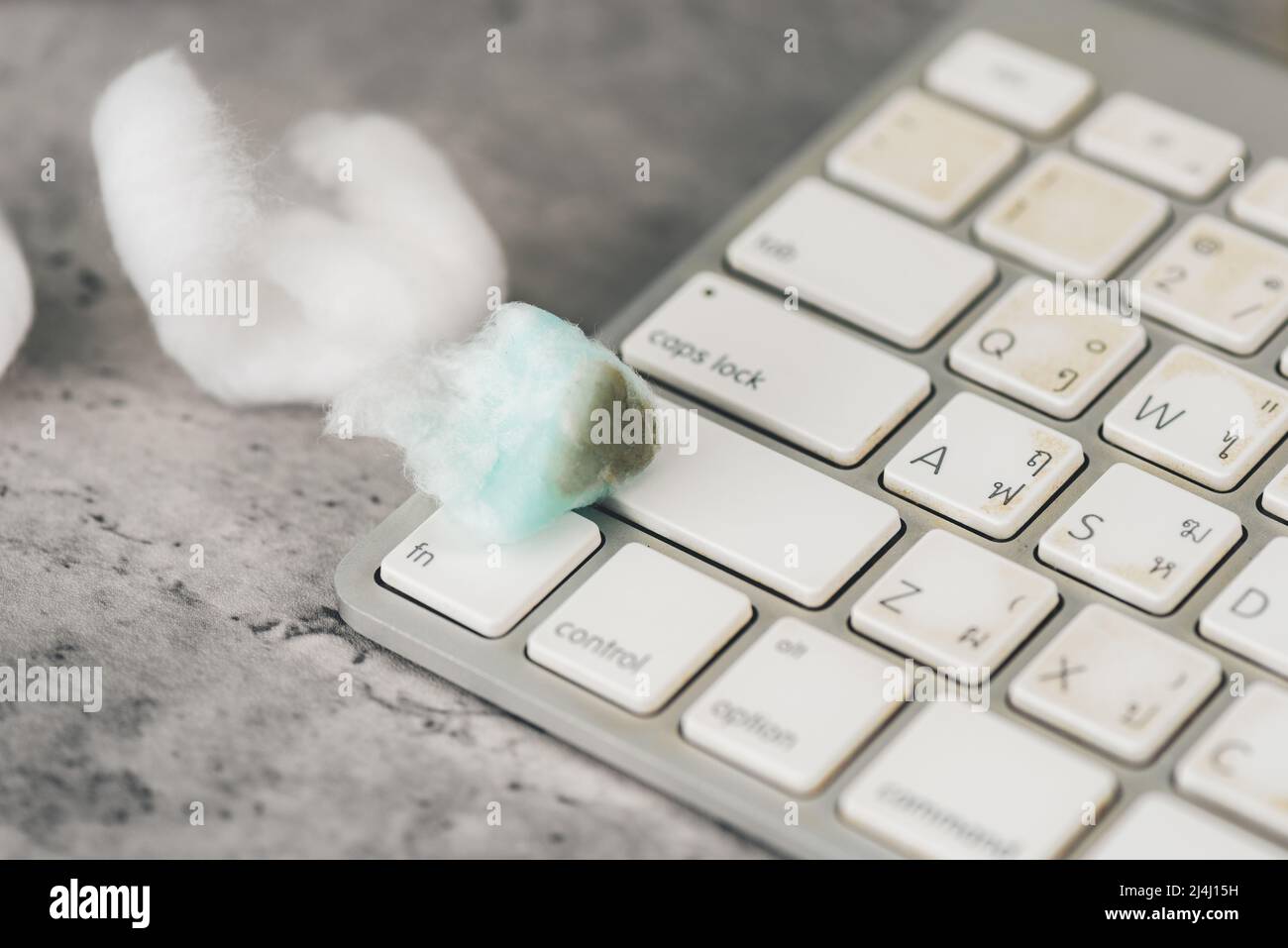 The man cleaning his computer keyboard. Grimy, more bacteria on ...