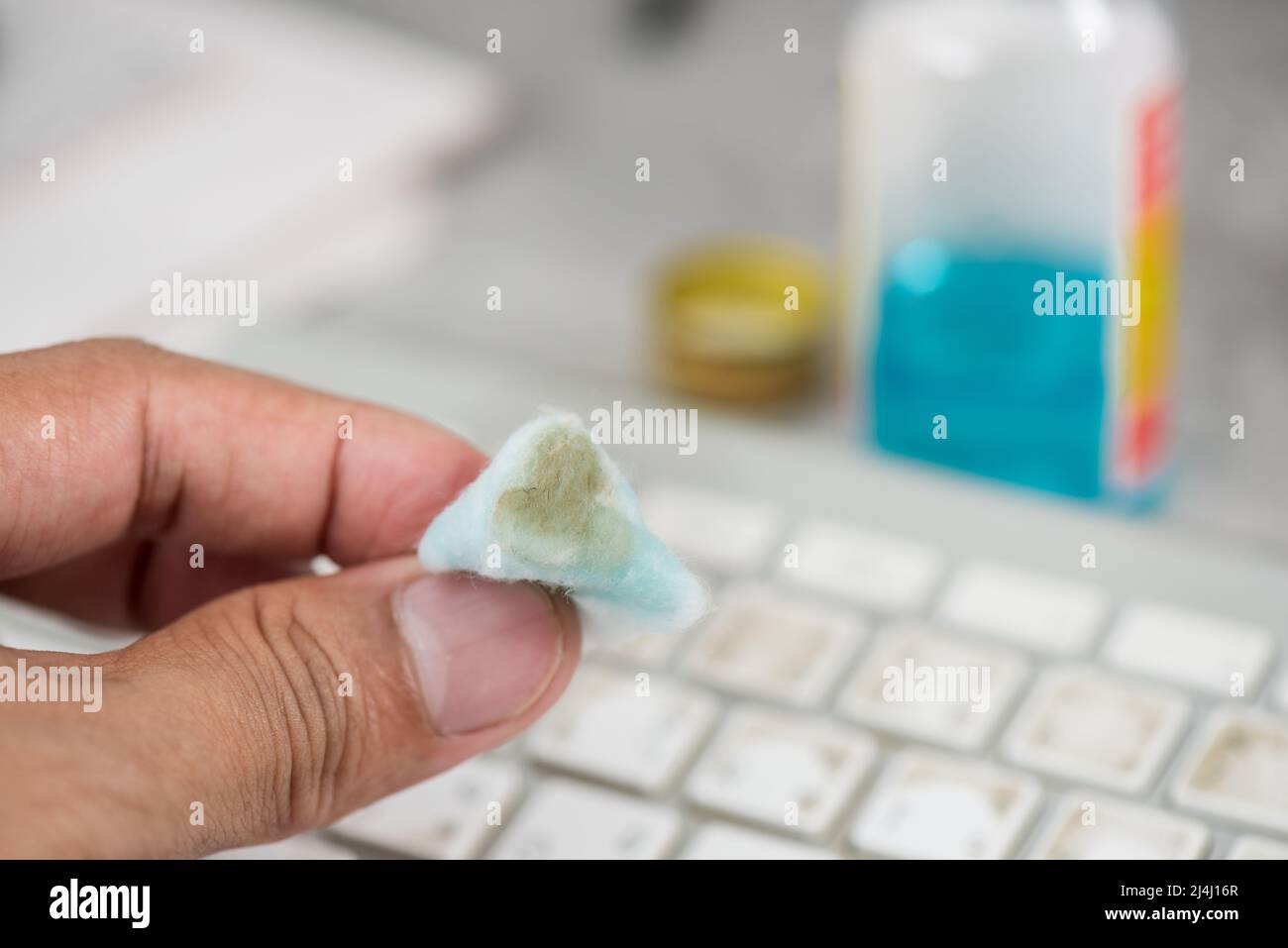 The man cleaning his computer keyboard. Grimy, more bacteria on ...