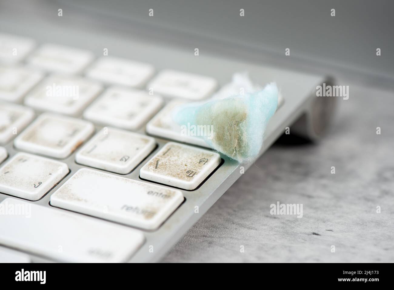 The man cleaning his computer keyboard. Grimy, more bacteria on ...