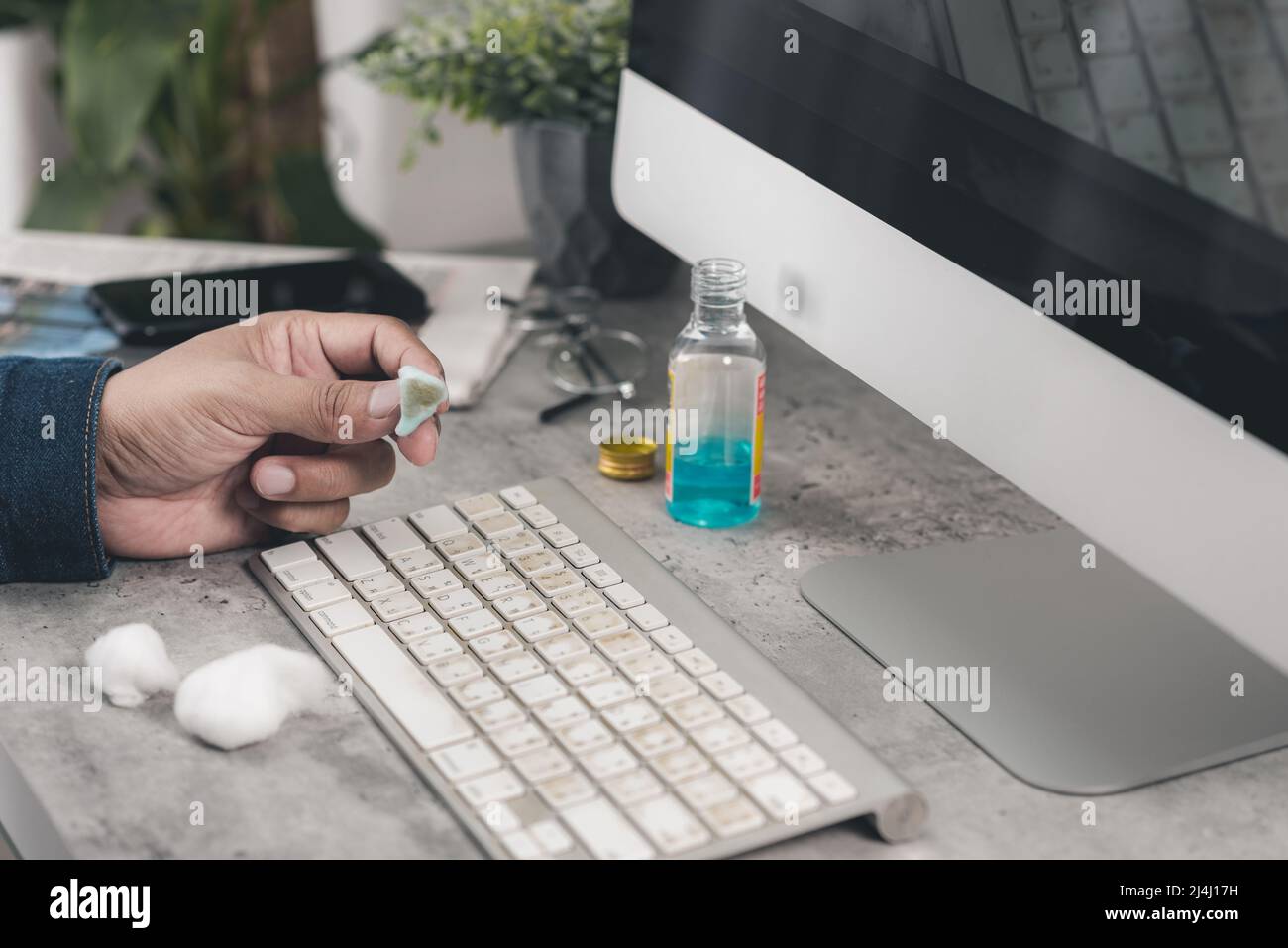 The man cleaning his computer keyboard. Grimy, more bacteria on ...