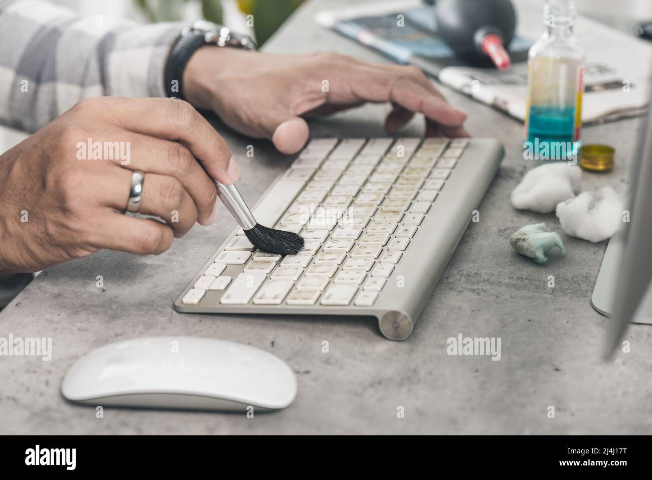 The man cleaning his computer keyboard. Grimy, more bacteria on ...