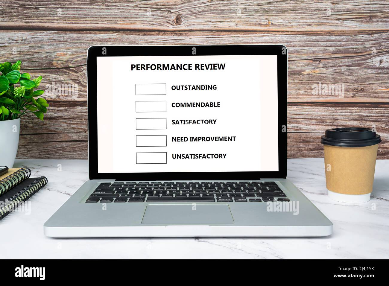 Performance review checklist text on white screen laptop or notebook ...