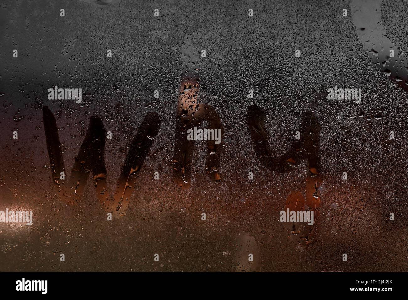 Inscription word why on a foggy window Stock Photo - Alamy