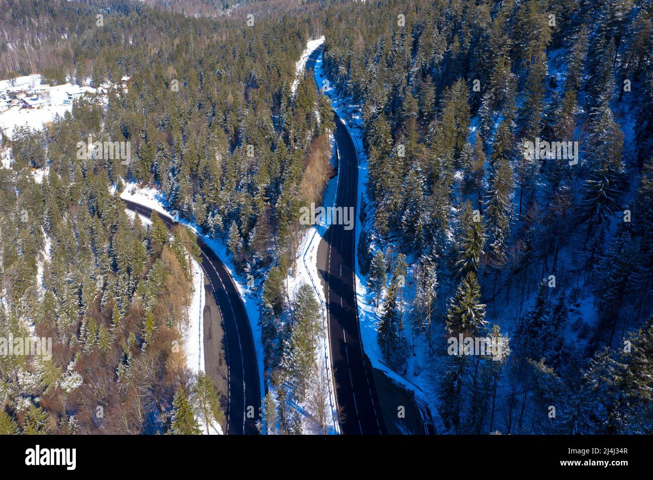 Aerial view of a mountain road called Pötschenpass in winter. Bad ...