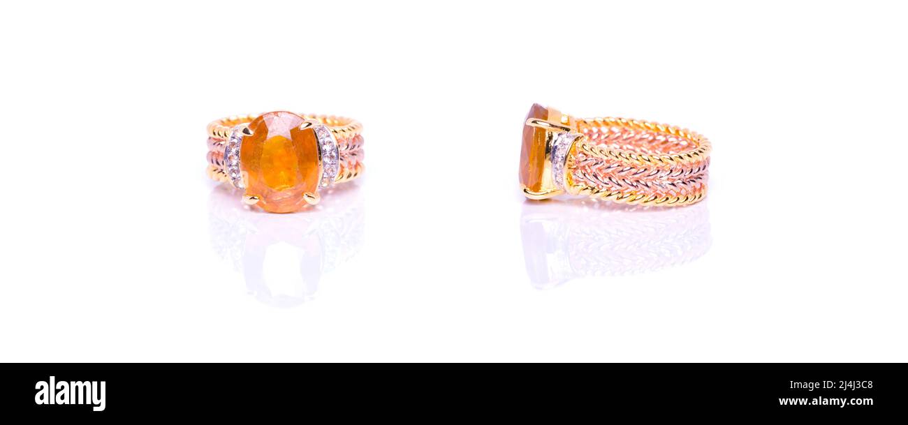 Yellow sapphire and Diamond Jewel or gems ring on white background with ...