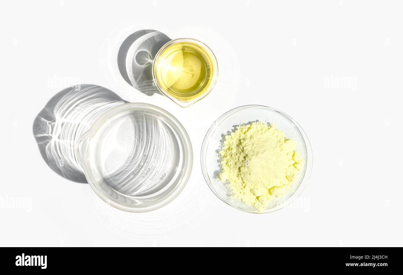 Cosmetic chemicals ingredient on white laboratory table. Sulfur Powder ...