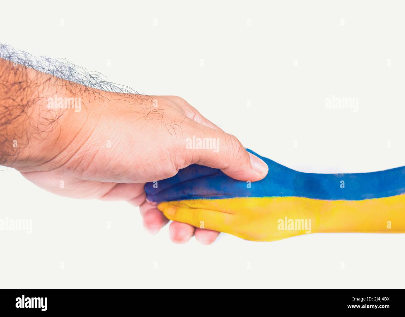 An adult shook hands with a child who painted the Ukrainian flag on his ...