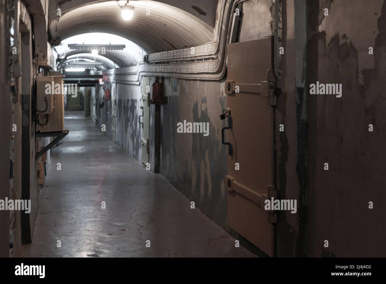 Abstract dark grungy industrial interior, underground military bunker ...