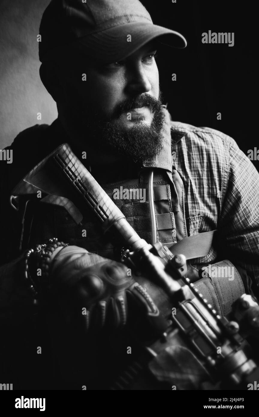 Armed soldier ready for battle. Military concept Stock Photo - Alamy