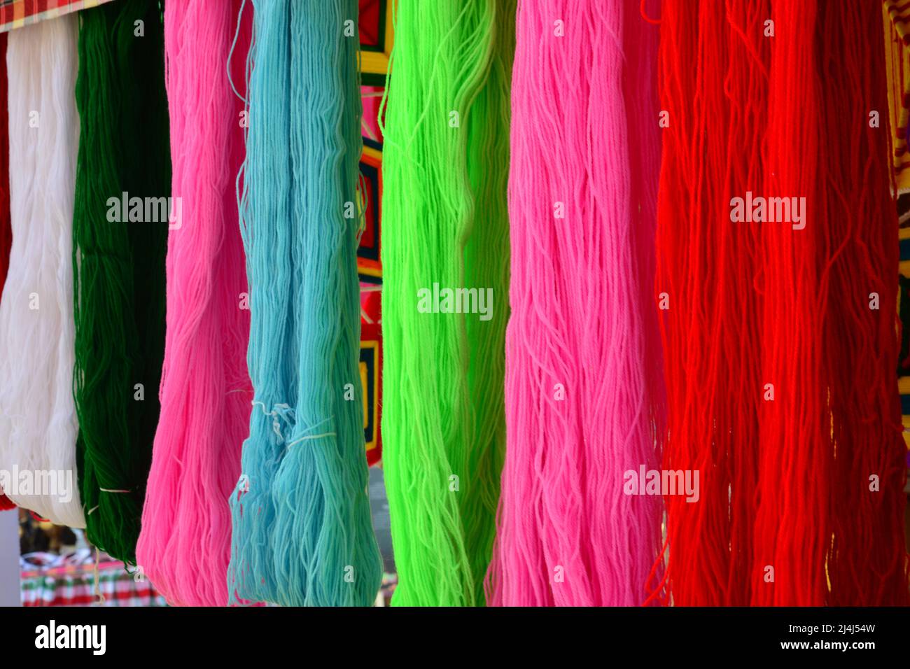 Colorful yarn for weaving Stock Photo - Alamy